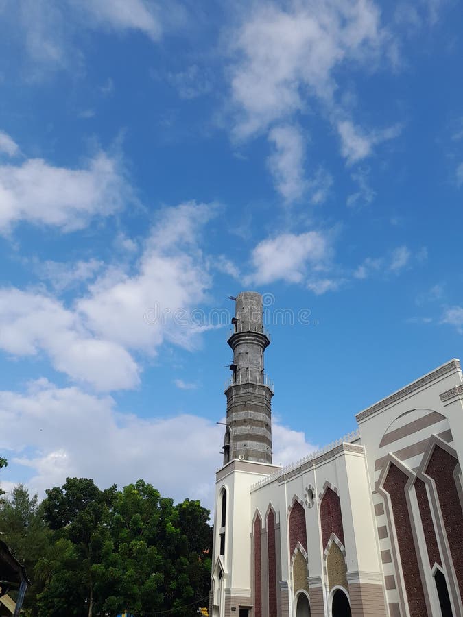 Mosque Minaret Against Blue Sky Background Stock Image - Image of ...