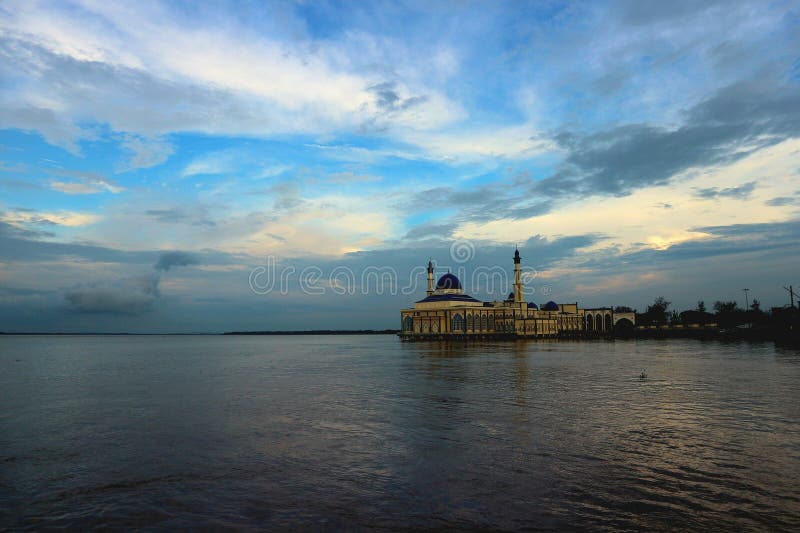 A Mosque S Stunning Blue Domes Reflecting on Calm River Waters Stock ...