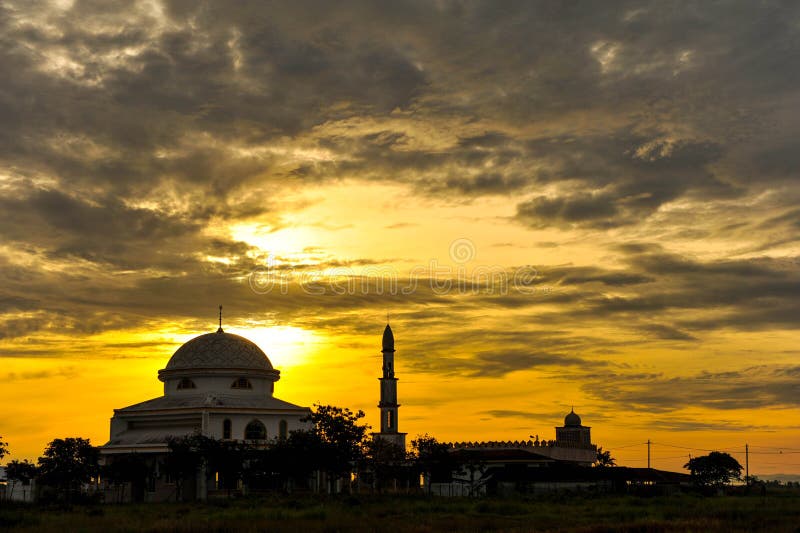 A mosque with the sunset stock photo. Image of field - 80524526