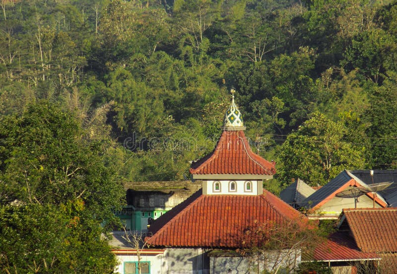 The Mosque Tower Amidst Shady Trees with Dense Green Leaves Stock Image ...