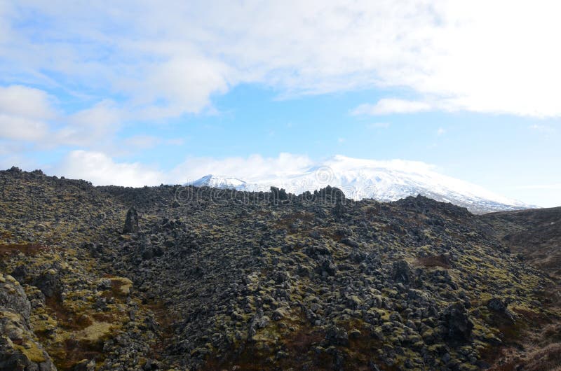Moss Covered Lava Rock Field with Mountains Stock Image - Image of ...
