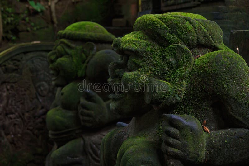 Moss-covered Statues in the Monkey Forest Jungle Stand As Guardians of ...