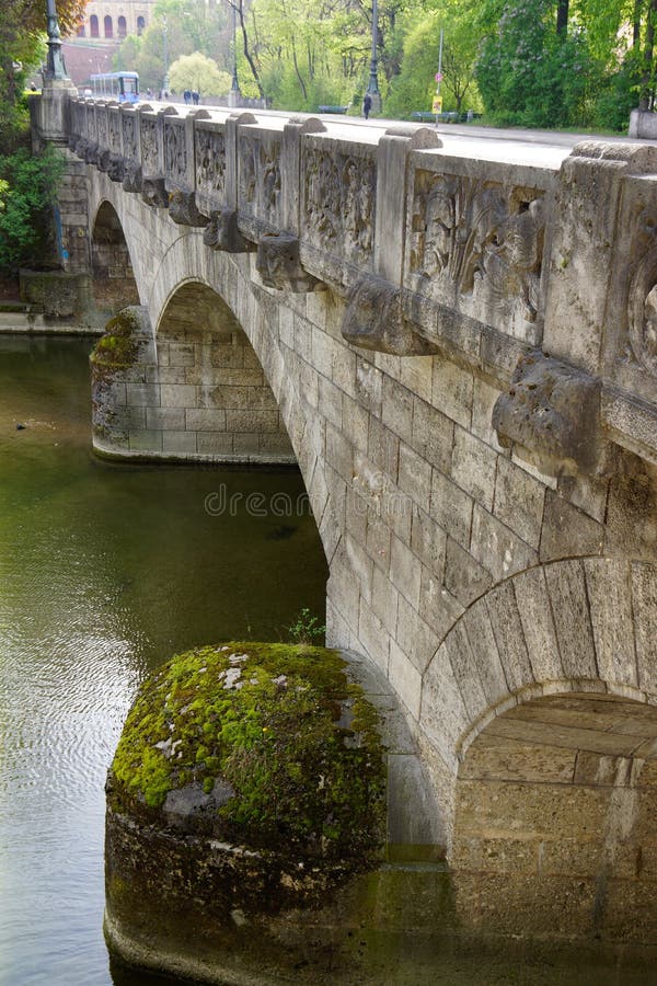 Moss Covered Stone Bridge Over Isar River in Munich Stock Image - Image ...