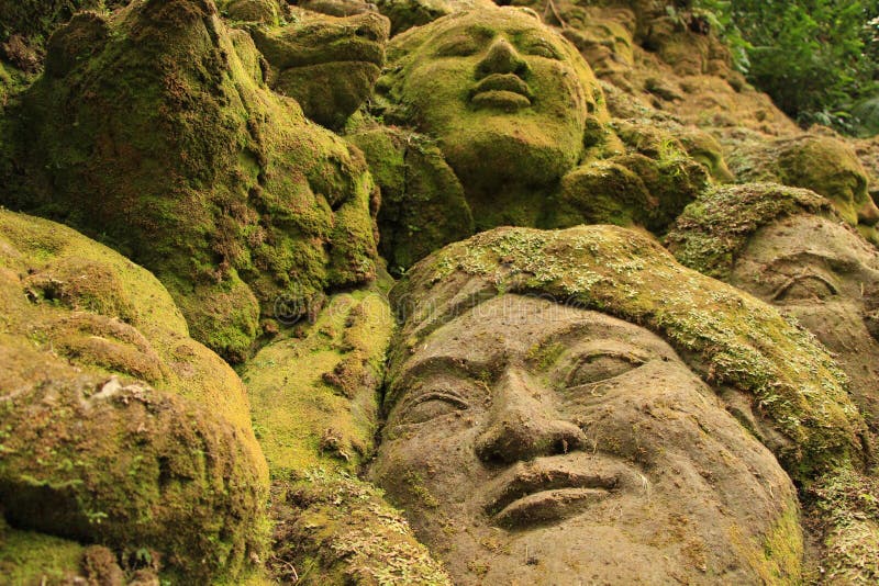 Moss Covered Stone Sculptures Stock Image - Image of island, people ...