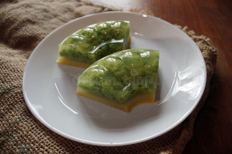 Fresh Moss Green Pudding Dessert on White Plate Over Burlap Background ...