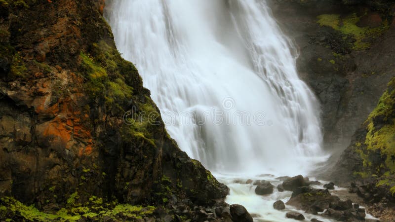 Mossy Ravine with Waterfall Inbetween Volcanic Rock Stock Image - Image ...