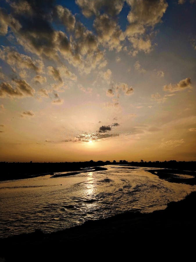 Most Beautiful Sunsit and Clouds Stock Image - Image of clouds, water ...