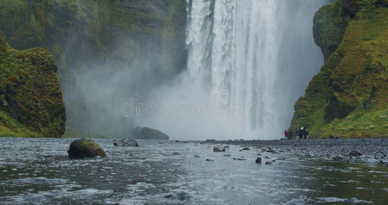 Most Famous Skogafoss Waterfall with River Reflection, Iceland Stock ...