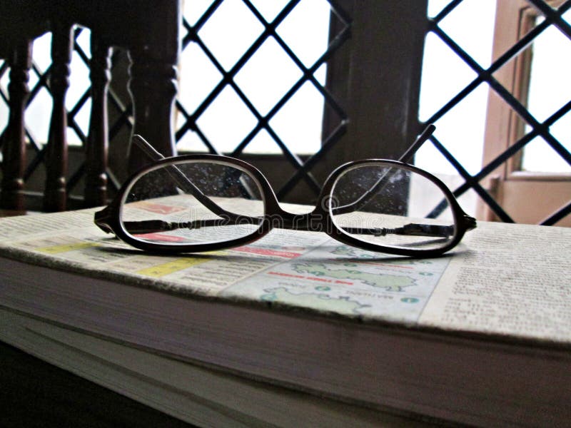 Specs and books stock image. Image of book, black, eyeglasses - 12764045