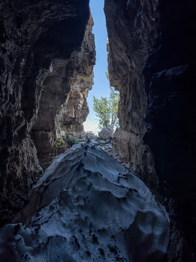 Most Scenic Views of Snow Pits between Big Cliffs in Mountains Stock ...