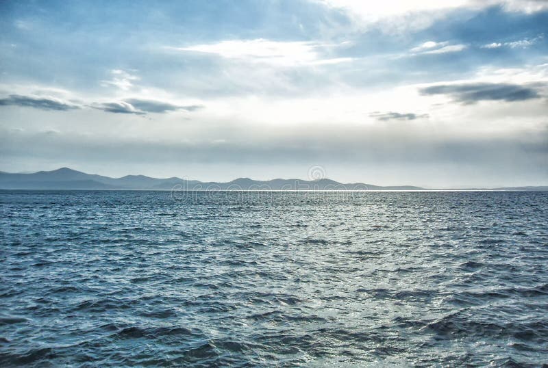 Mostly Cloudy Day on the Wavy Sea Stock Image - Image of landscape ...