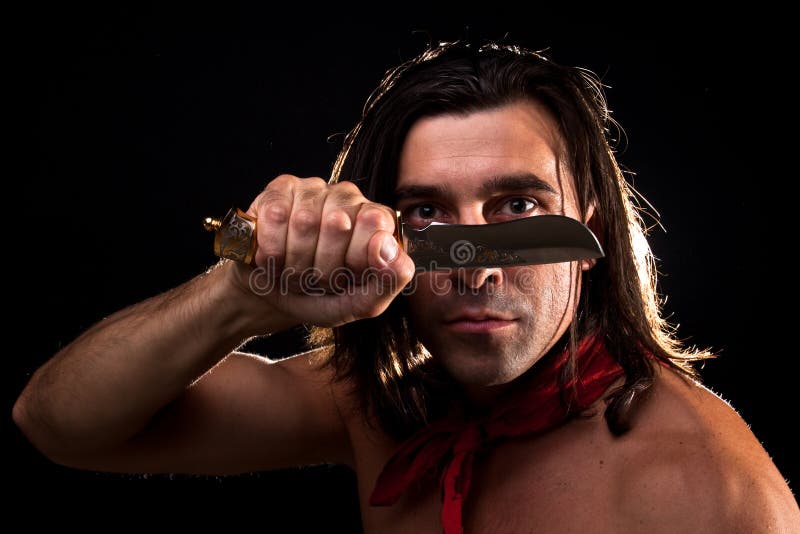 Mostrando a faca foto de stock. Imagem de orgulho, homem - 10743734