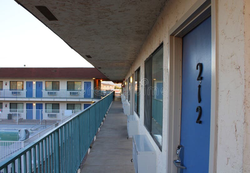 Motel Hallway Blue Room Door Stock Image - Image of composite, facade ...