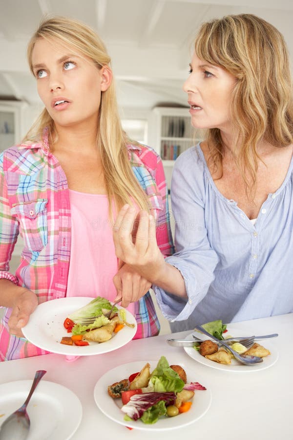 Mother Arguing with Teenage Daughter Stock Photo - Image of eating ...