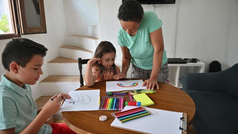 Mother Helping Children with Art Homework at Home, Fostering Creativity ...