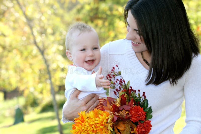 Mother And Baby Boy With Leaves - Fall Theme Stock Photo - Image of ...