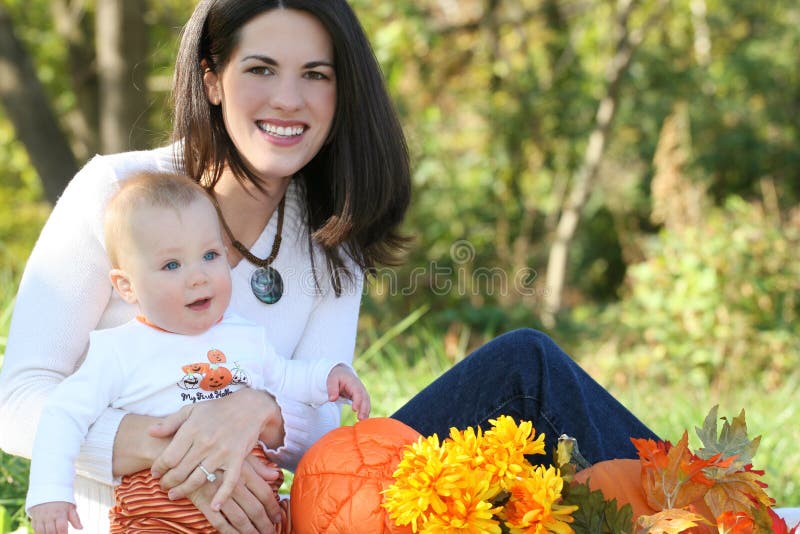Mother and Baby Boy with Leaves - Fall Theme Stock Photo - Image of ...