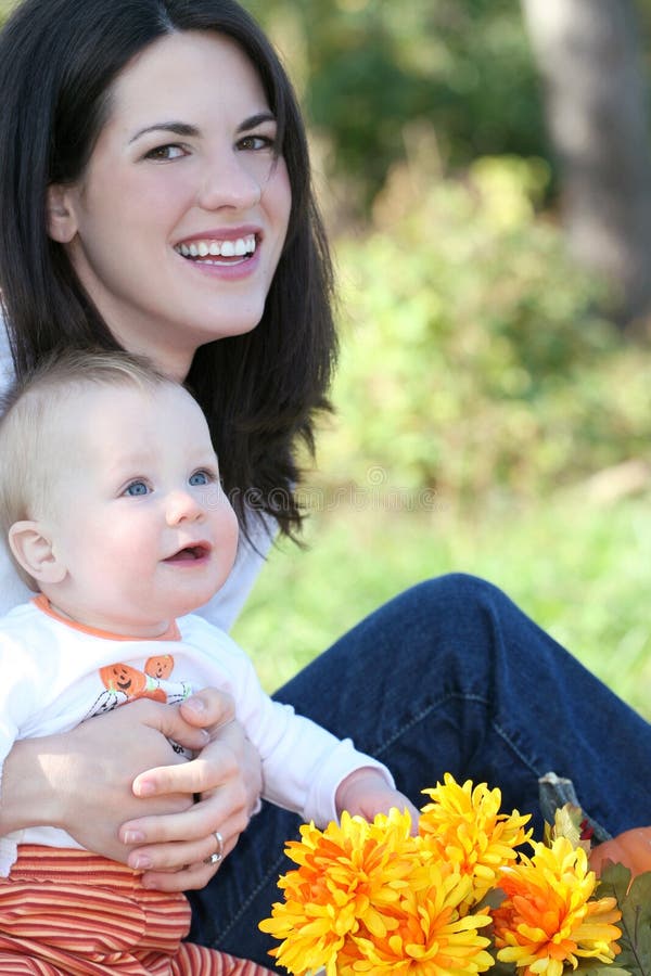 Mother and Baby Boy with Leaves - Fall Theme Stock Photo - Image of ...