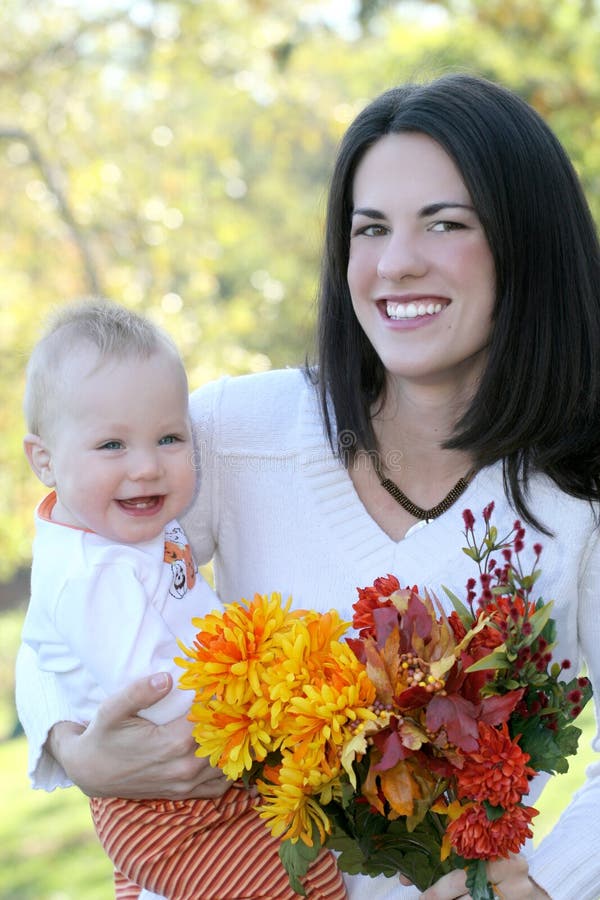 Mother and Baby Boy with Leaves - Fall Theme Stock Photo - Image of ...