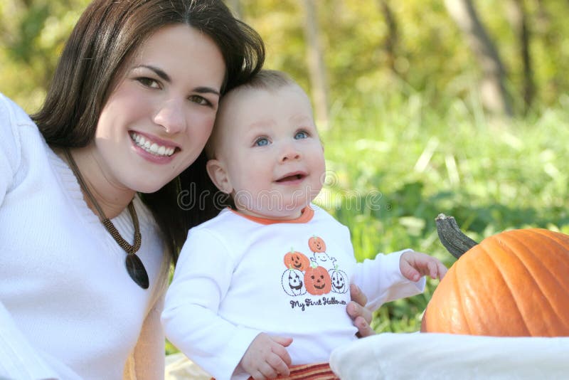 Mother and Baby Boy with Leaves - Fall Theme Stock Photo - Image of ...