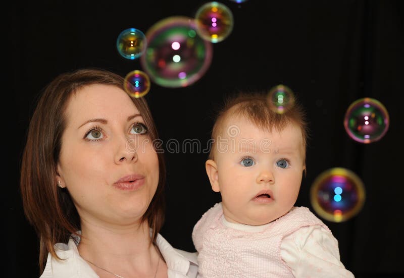 Mother with Baby and Bubbles Stock Image - Image of affable, female ...
