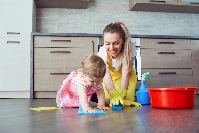 Mother and Baby are Cleaning the House Stock Image - Image of ...