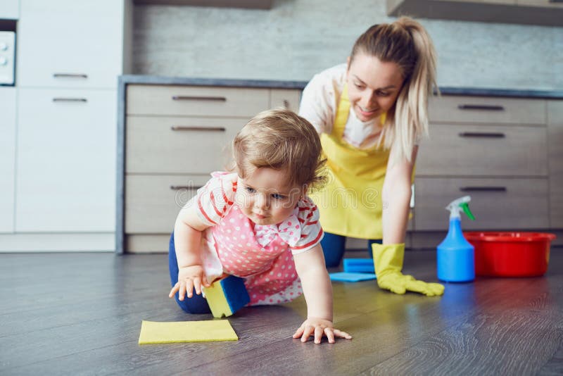 Mother and Baby are Cleaning the House Stock Photo - Image of portrait ...