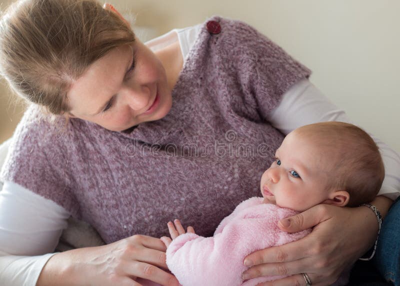 Mother and baby stock image. Image of sitting, staring - 76472145