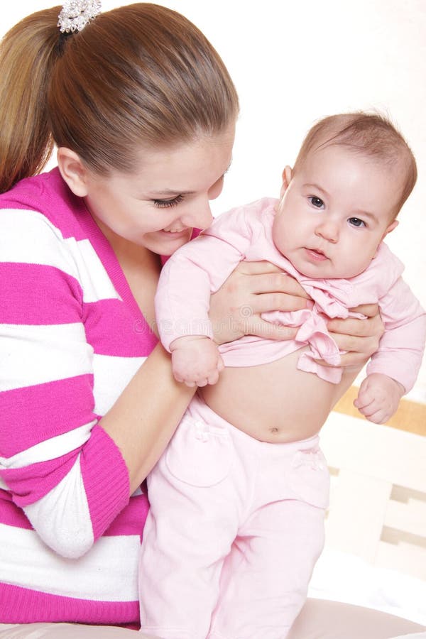 Mother and baby at home stock image. Image of daughter - 24119997