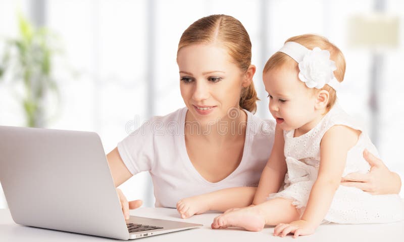 Mom and Baby with Computer Working from Home Stock Image - Image of ...