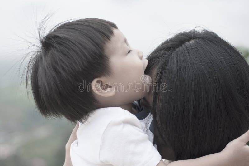 Mother and baby hugging stock photo. Image of cute, young - 84056992