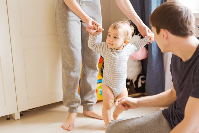 Mother and Baby Legs. First Steps Stock Image - Image of family, help ...