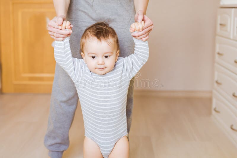 Mother and Baby Legs. First Steps Stock Image - Image of baby, mother ...