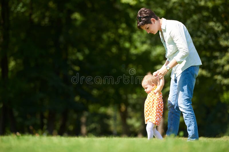 Mother and baby in park stock photo. Image of outdoors - 56456804