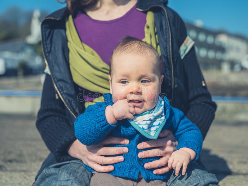 Mother with Baby Resting Outside Stock Image - Image of baby, mother ...