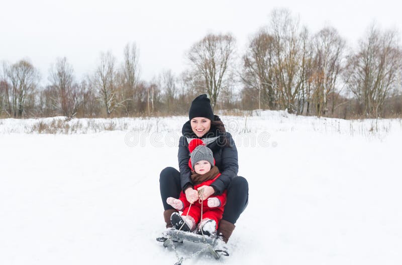 Mother with the Baby on Sledge Stock Image - Image of nature, white ...
