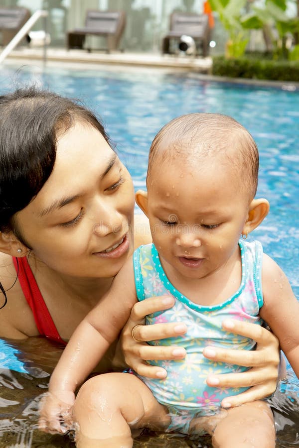 Mother and Baby at Swimming Pool Stock Image - Image of parenting ...