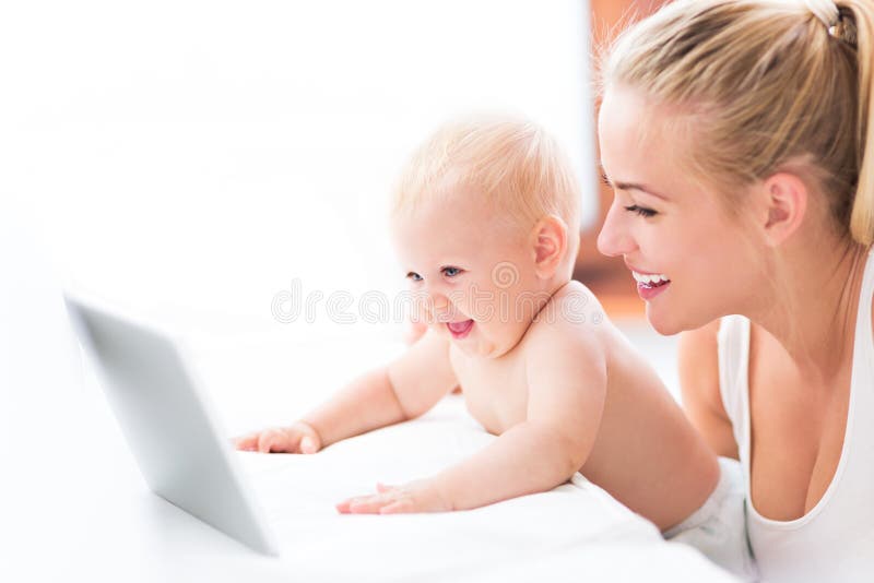 Happy Baby with Parents Using Digital Tablet Stock Photo - Image of ...
