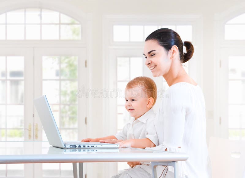Mother and Baby Using Laptop Stock Photo - Image of smile, people: 3206962