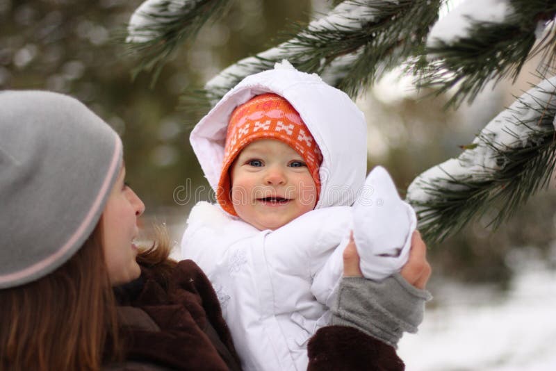 Mother with baby in Winter stock image. Image of nature - 11723189