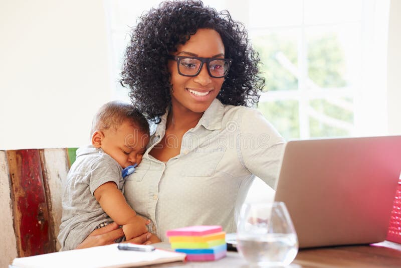 Mother with Baby Working in Office at Home Stock Photo - Image of ...