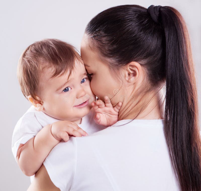 Happy Loving Family. Mother and Child Playing, Kissing and Hugg Stock ...