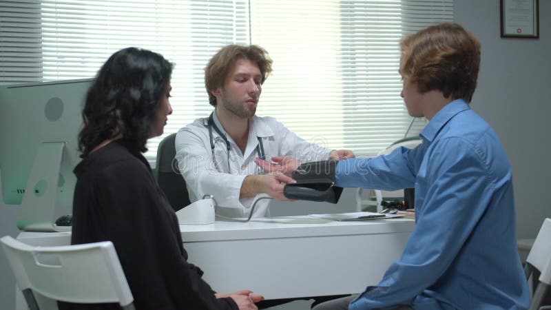 Doctor Take Off His Surgical Gloves Green Screen Stock Footage