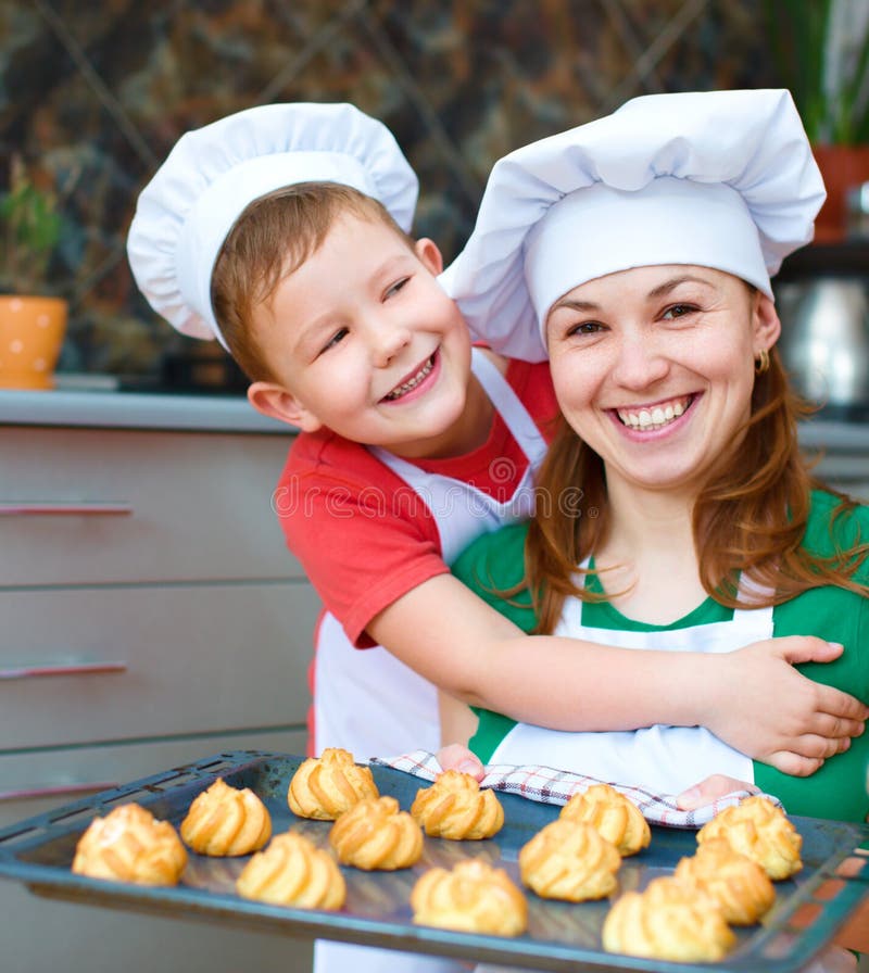 Mother with Boy Making Bread Stock Photo - Image of bread, male: 52520266
