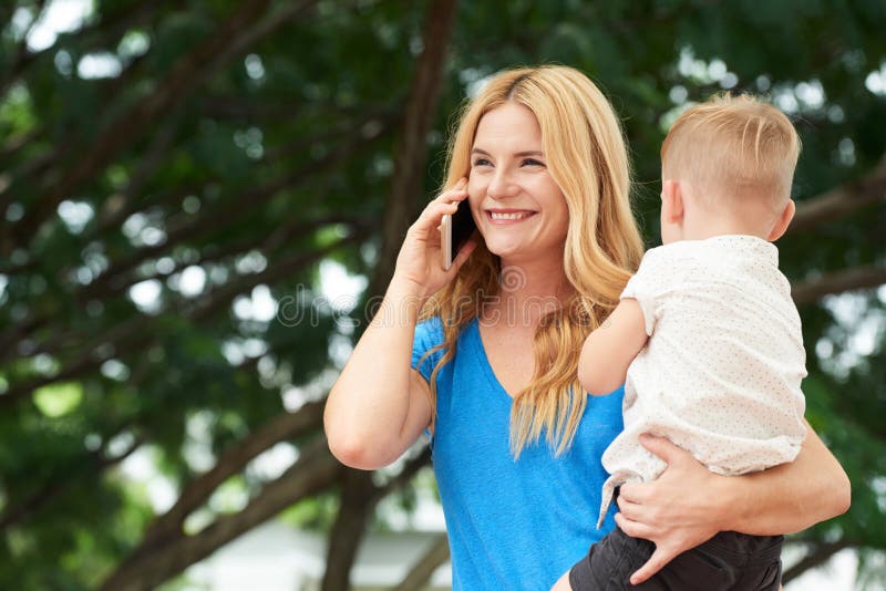 Mother calling on phone stock image. Image of people - 124917581
