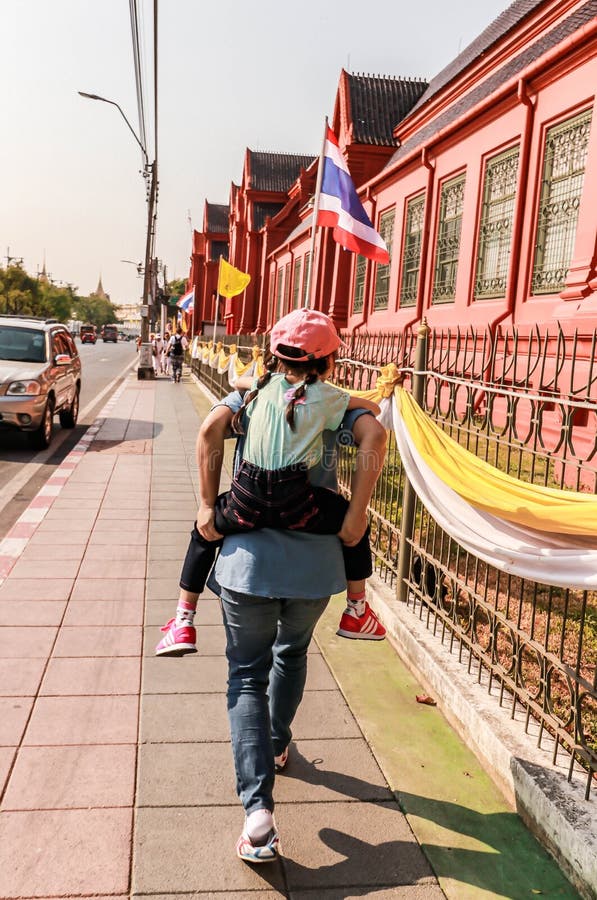 Mother Carry Dauther Walk on the Footpath Editorial Stock Image - Image ...