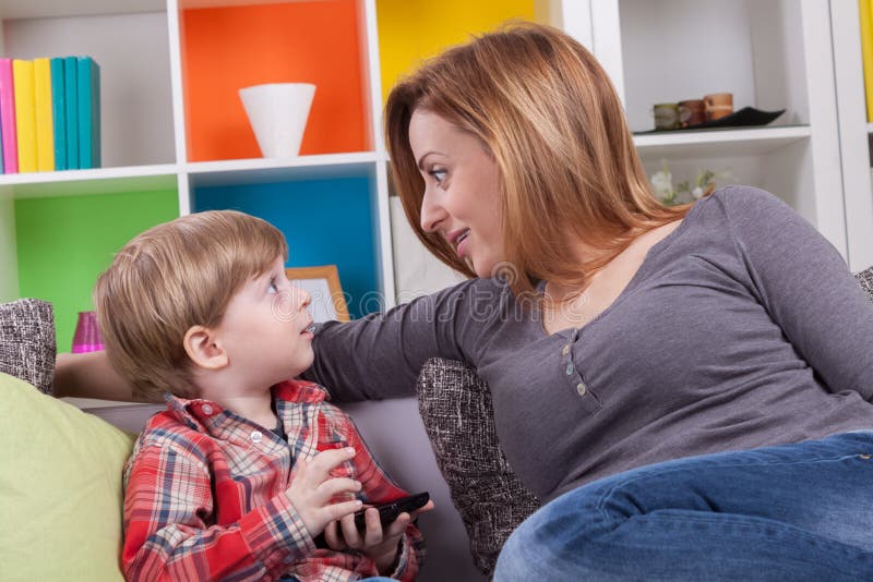 Mother Catch the Child To Play by Her Phone Stock Photo - Image of ...