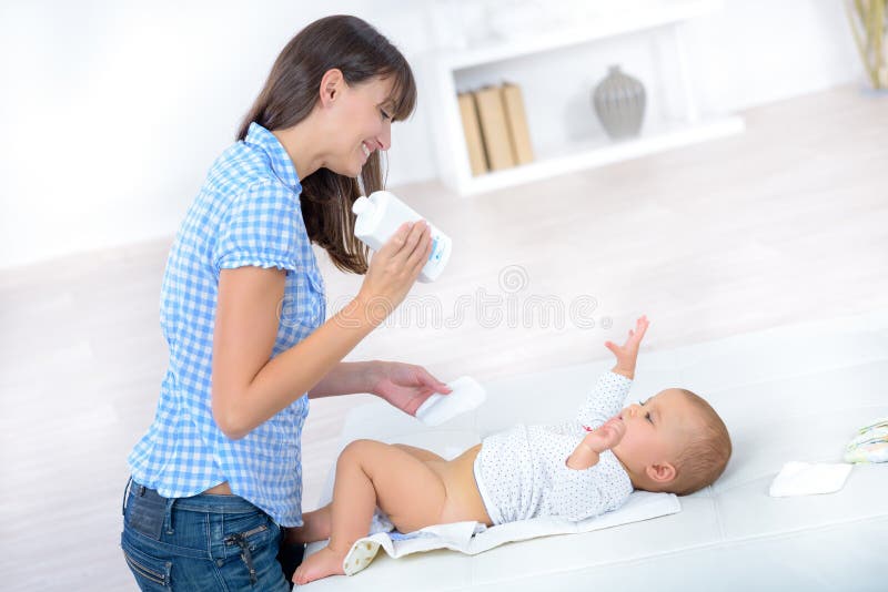Mother Changing Babys Diaper Stock Image - Image of table, innocence ...