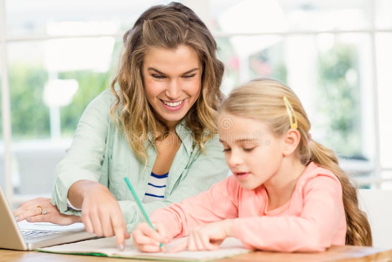 Mother Checking Daughters Homework Stock Image - Image of faces, fair ...