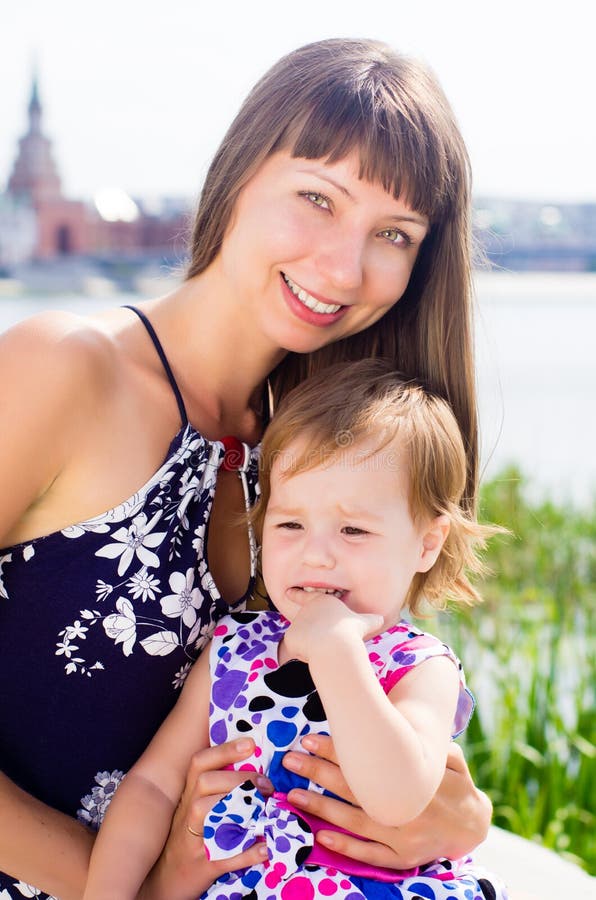 Mother and child on grass stock photo. Image of cheerful - 34142914